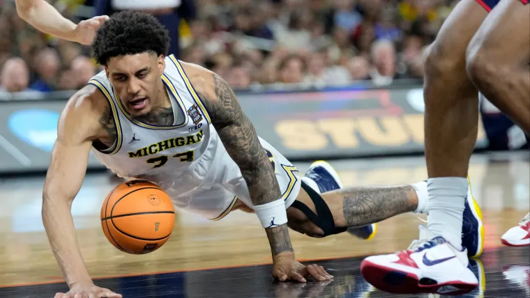 Michigan' star forward Yaxel Lendeborg poses an age-old problem for ...