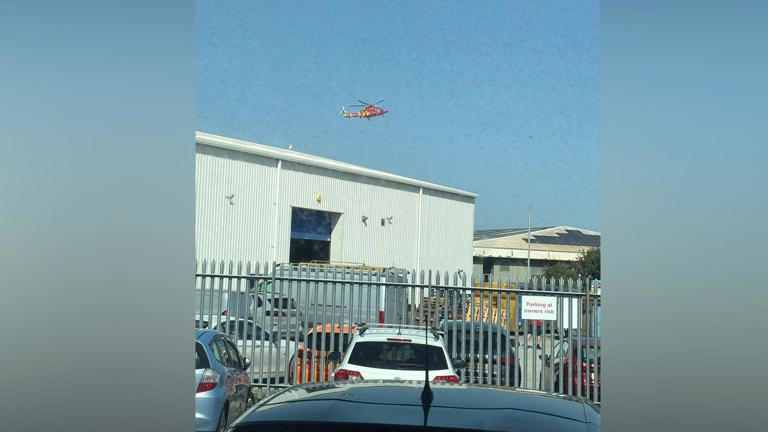 Man trapped by lorry at industrial estate