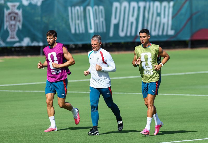 Soccer-Dias returns for Portugal as Ronaldo leads the line up front