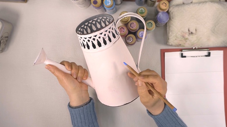 Transform an old watering can into beautiful patio decor that glows