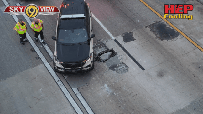 Large pothole snarls early morning traffic on I-24 in Chattanooga