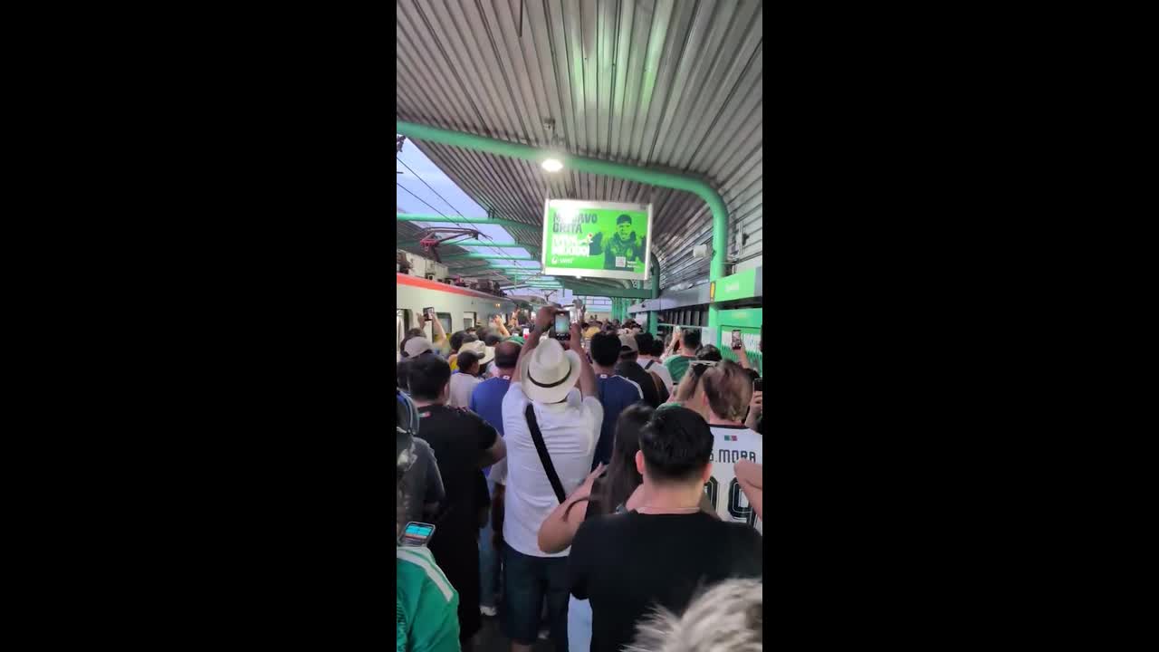 Japan and Mexico fans crowd station ahead of World Cup matches