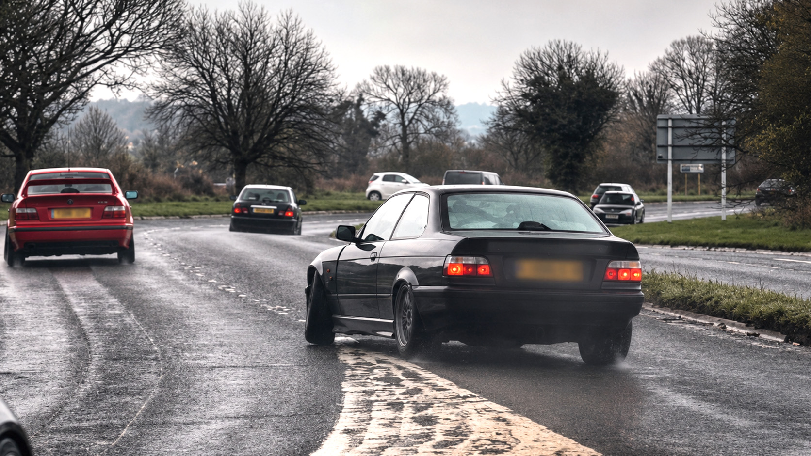 Castle Combe exit turns into a BMW slide-off moment