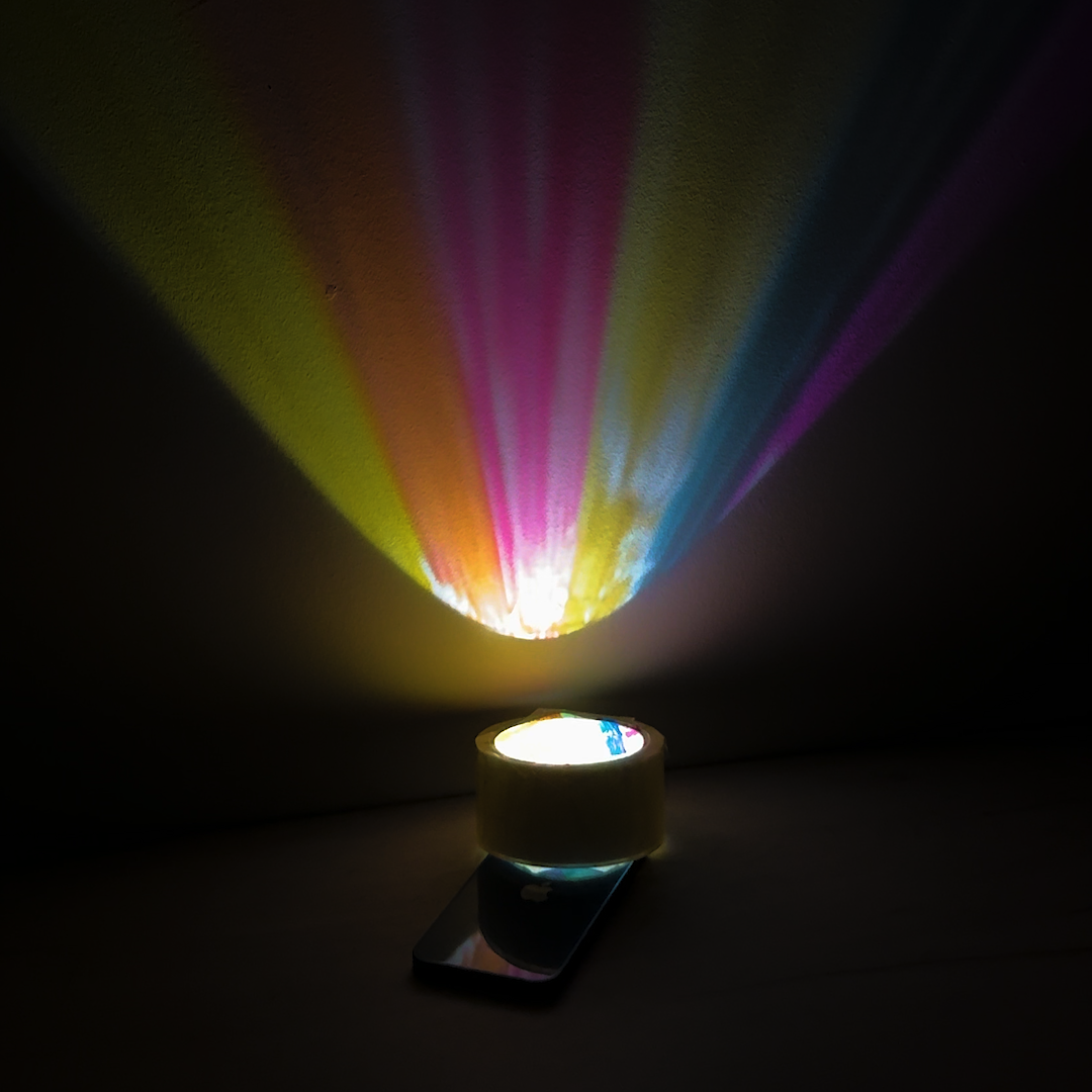 Create a DIY rainbow light using tape for colorful magic! 🤩🌈