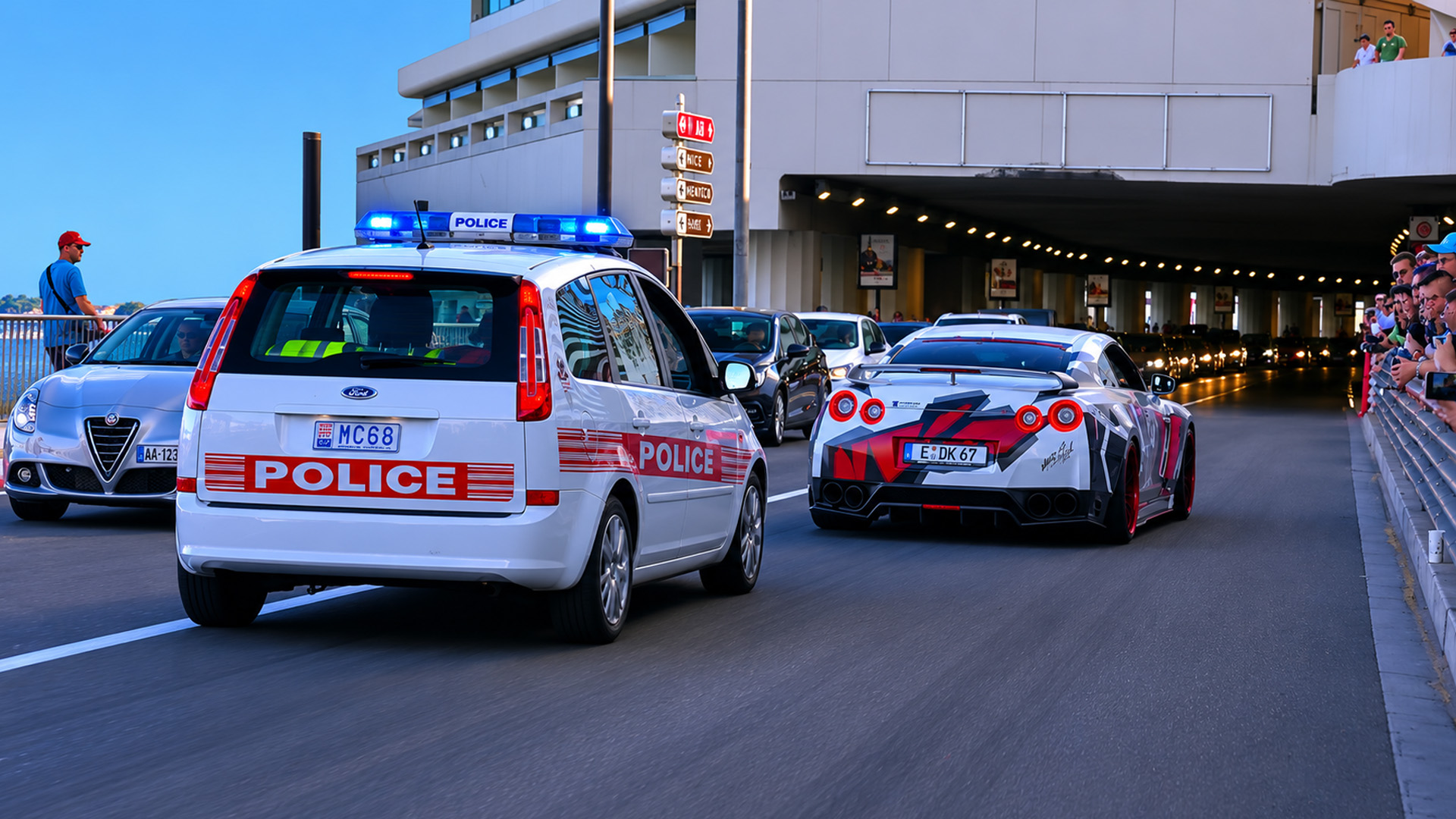 Nissan GT-R accelerates hard near police on city streets