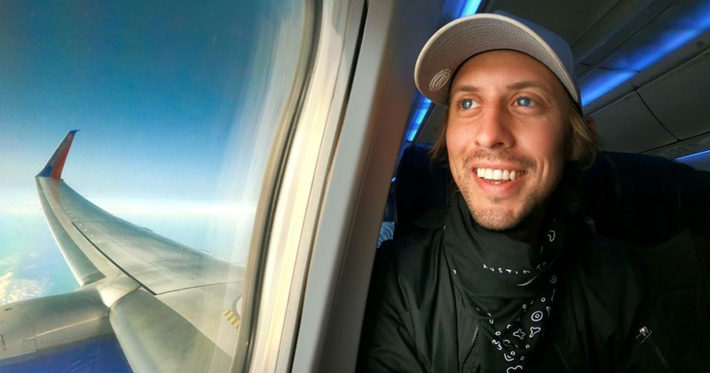 Passenger takes selfie on airplane with flight attendant in the ...