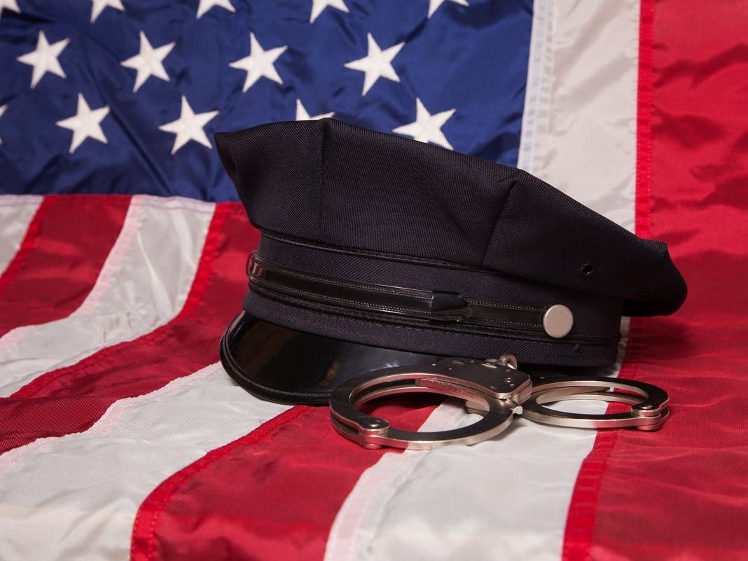 2 officers arrested for misuse of license plate reader system: Cherokee ...