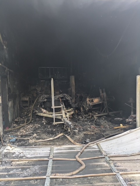 Boat and vehicle fire at Chesapeake auto repair shop