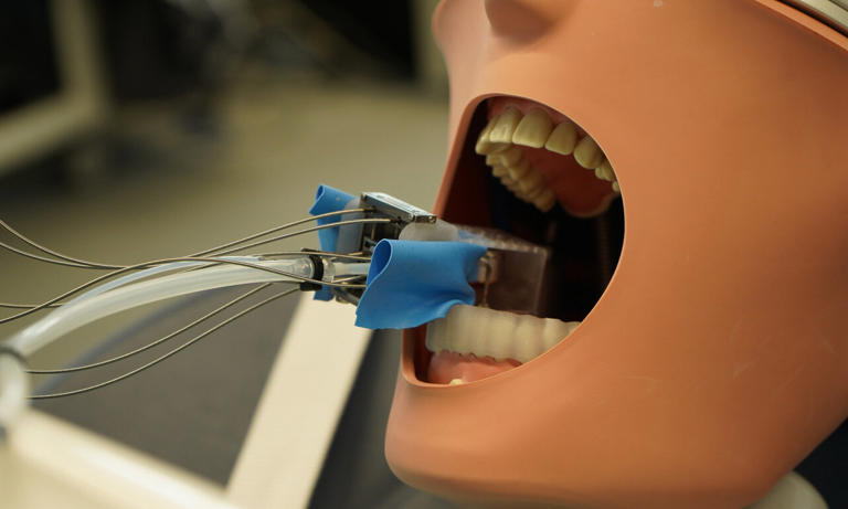 Mini robot simplifies dental treatment by preparing teeth for crowns