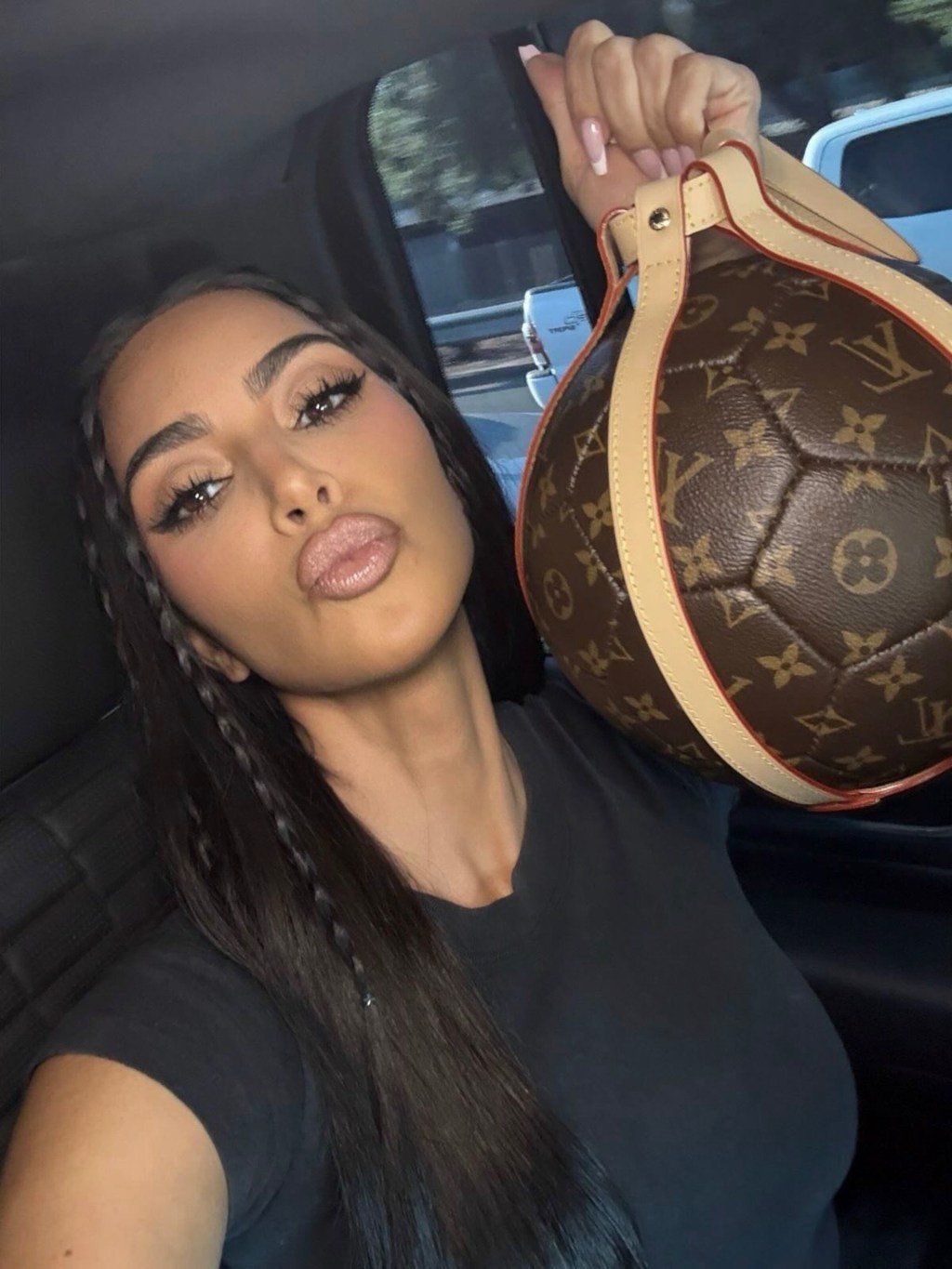 Kim Kardashian scores a rare Louis Vuitton soccer ball bag for the ...