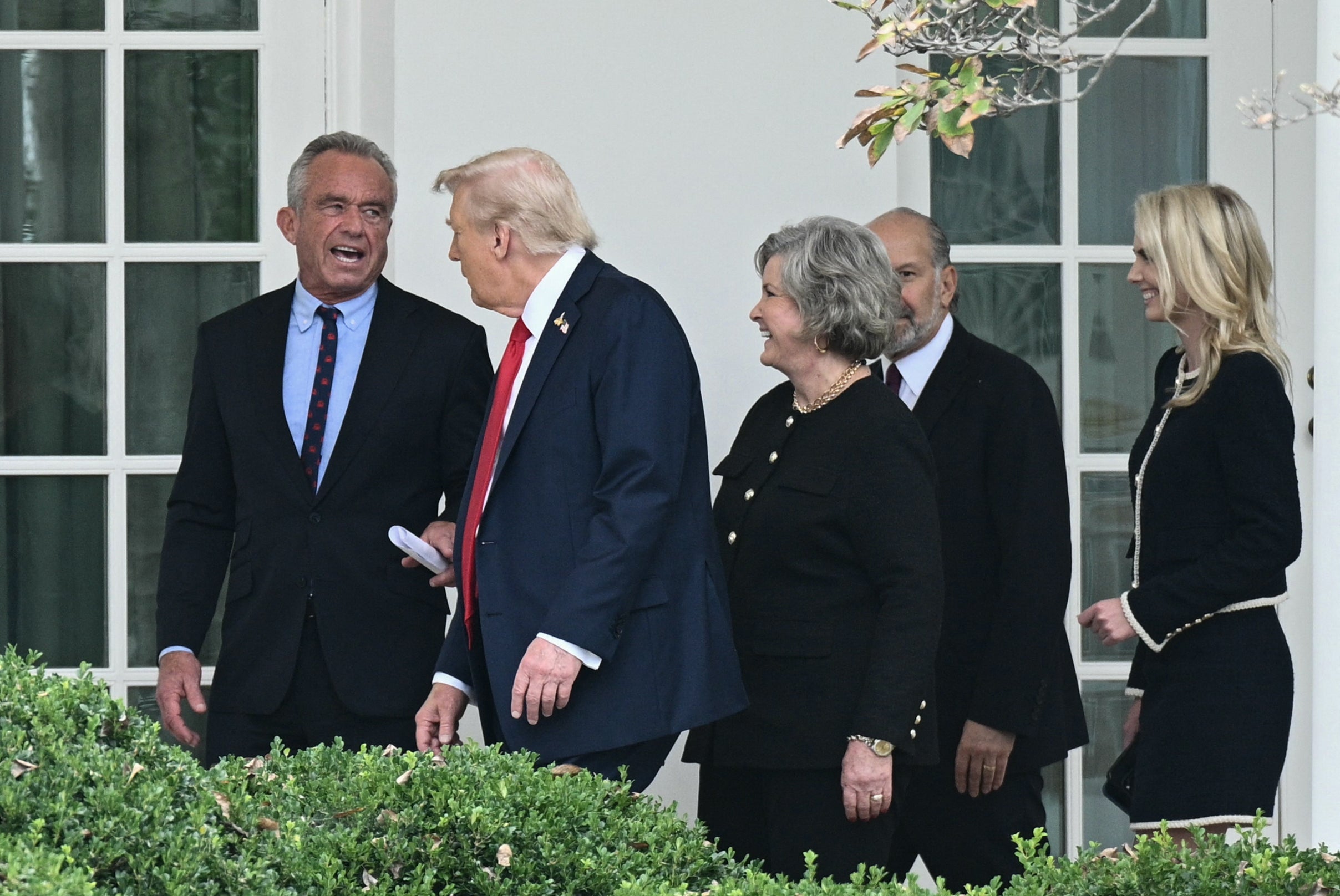 White House aide left adoring notes for Trump, new book reveals