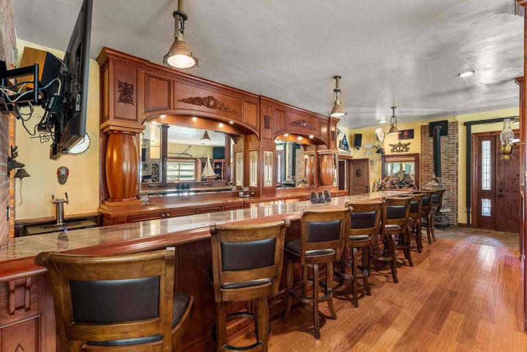 Off-grid, 22-acre Tahoe-area compound hugs Yuba River with fancy saloon ...