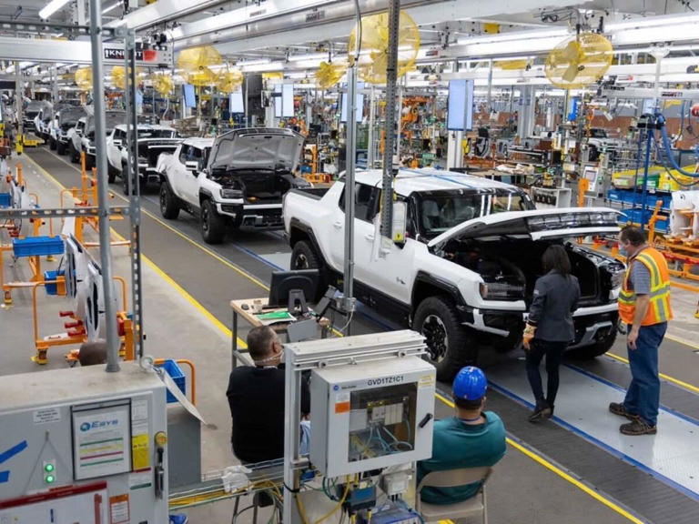 General Motors layoffs: GM replaces over 1,000 workers with 50 robots ...