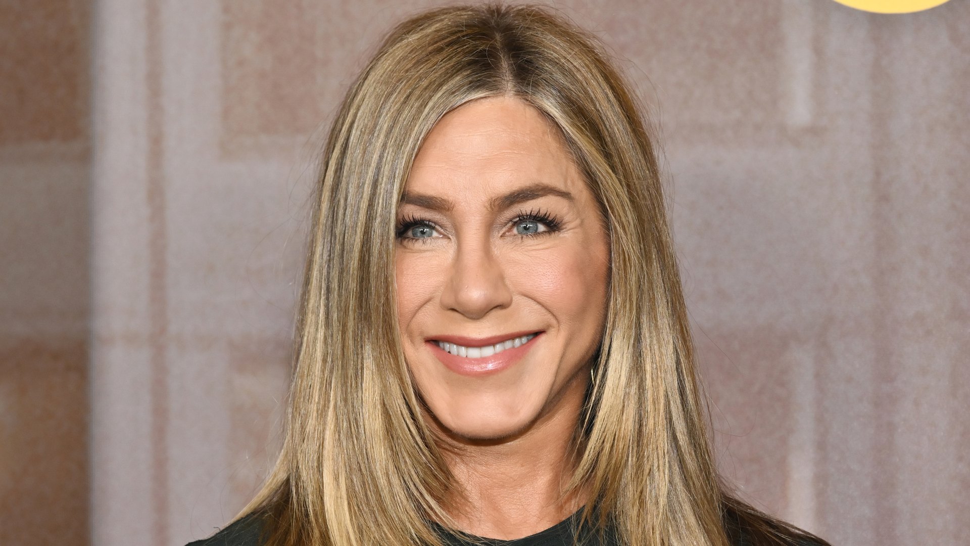 Jennifer Aniston's elevated gold hoops look just like this $14 pair