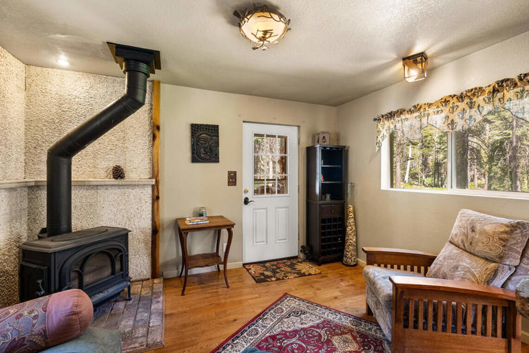 Off-grid, 22-acre Tahoe-area compound hugs Yuba River with fancy saloon ...