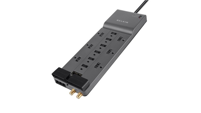 Why do some power strips & surge protectors have coaxial cable connectors?