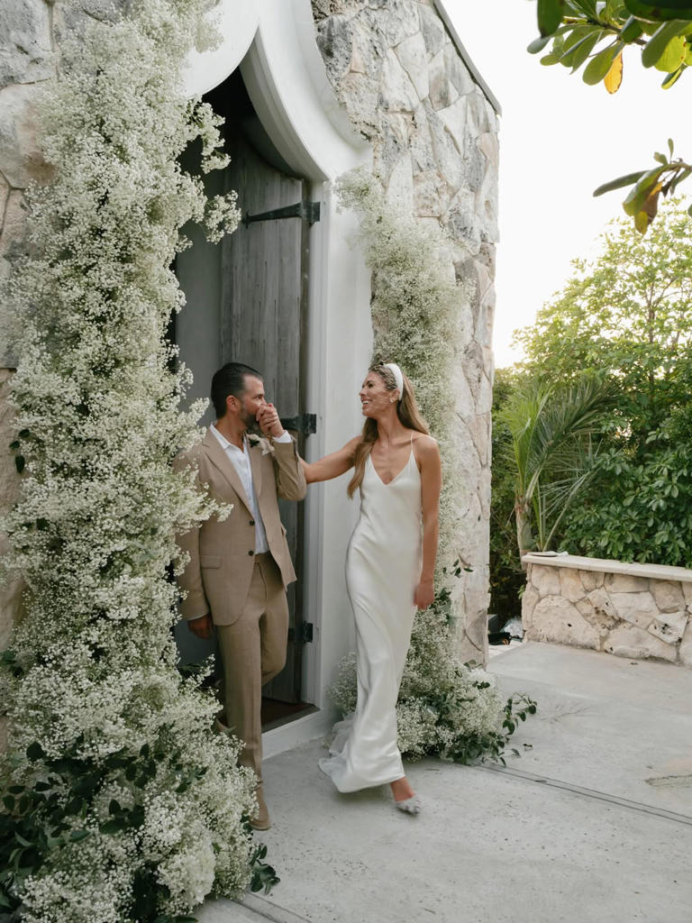 Bettina Anderson marries Donald Trump Jr. in slinky silk wedding dress