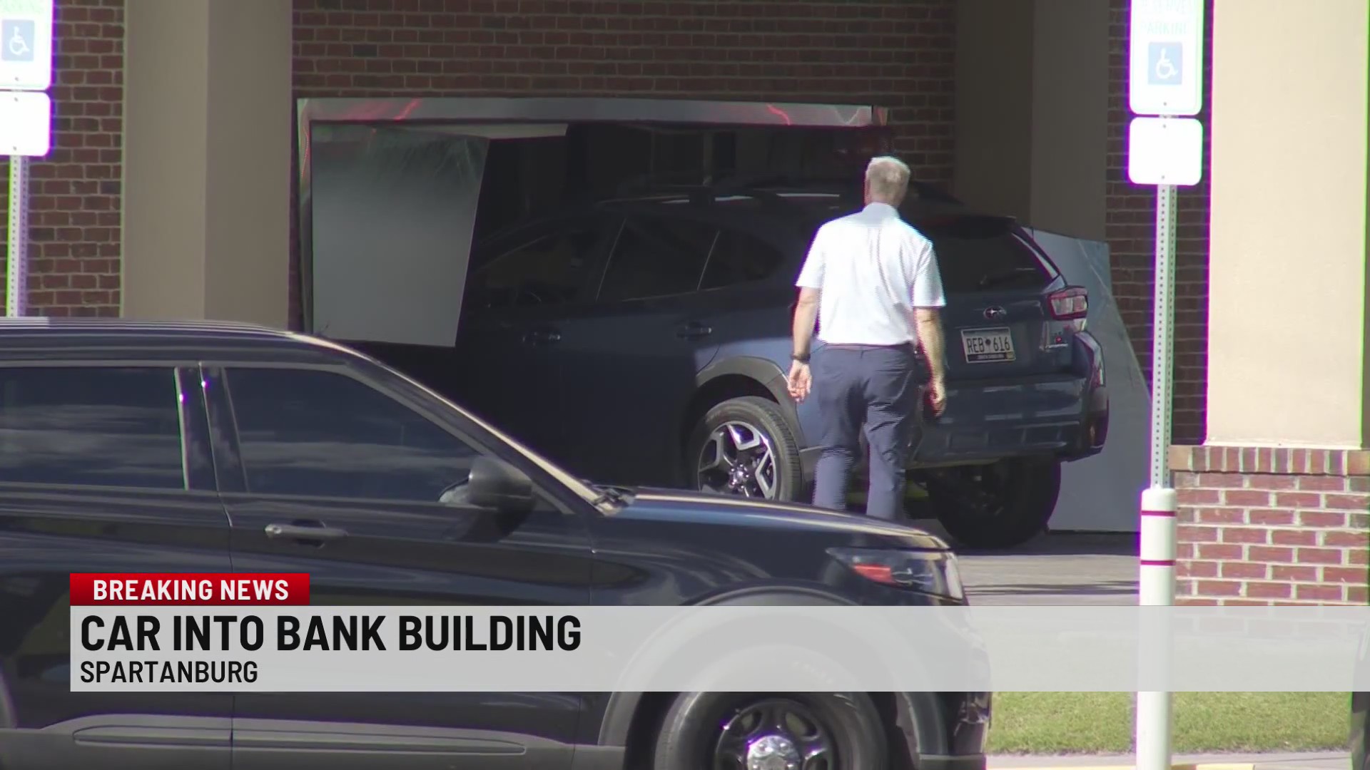 Car crashes into Spartanburg bank