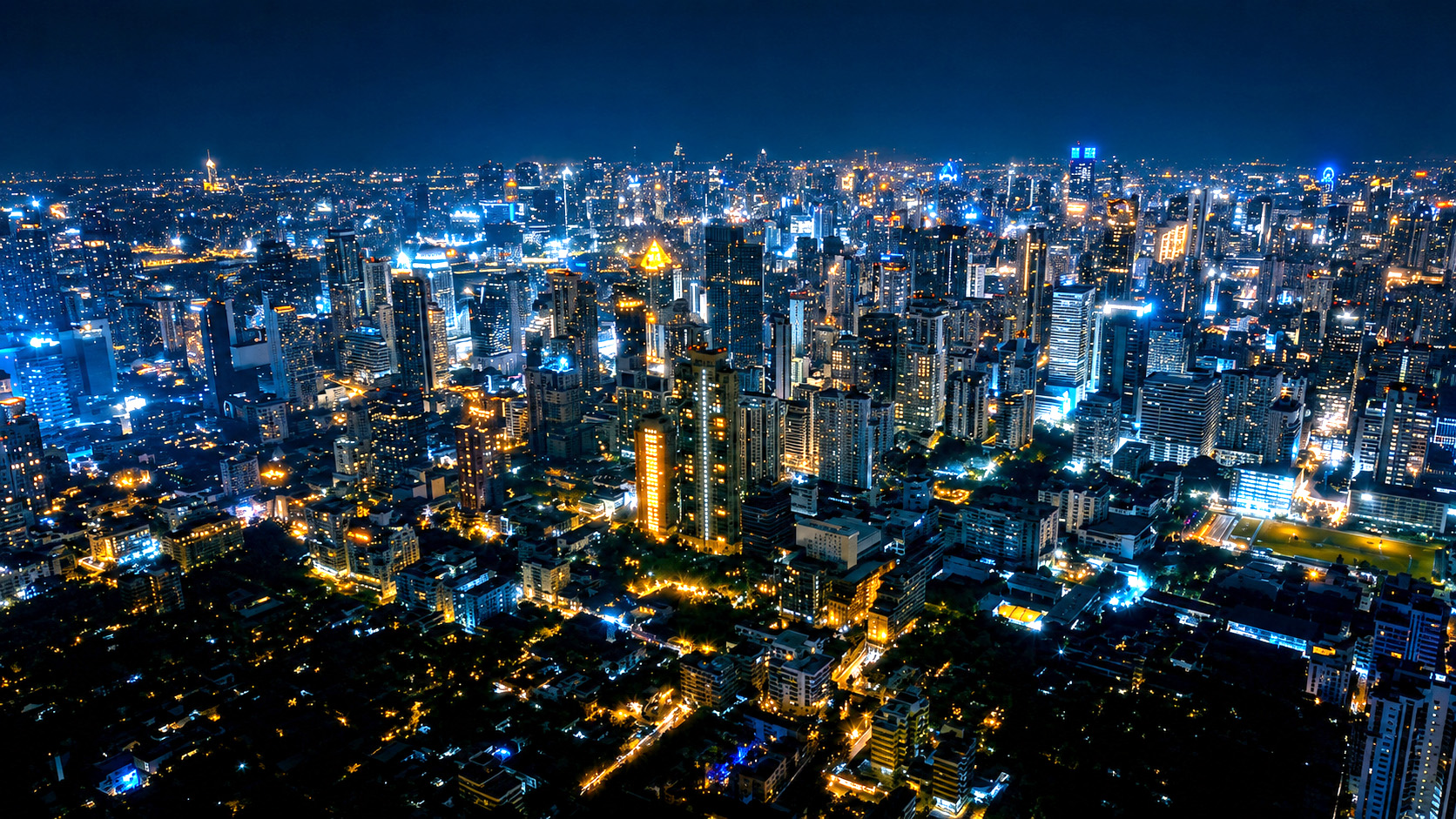 Mumbai’s night skyline glowing along the Arabian Sea