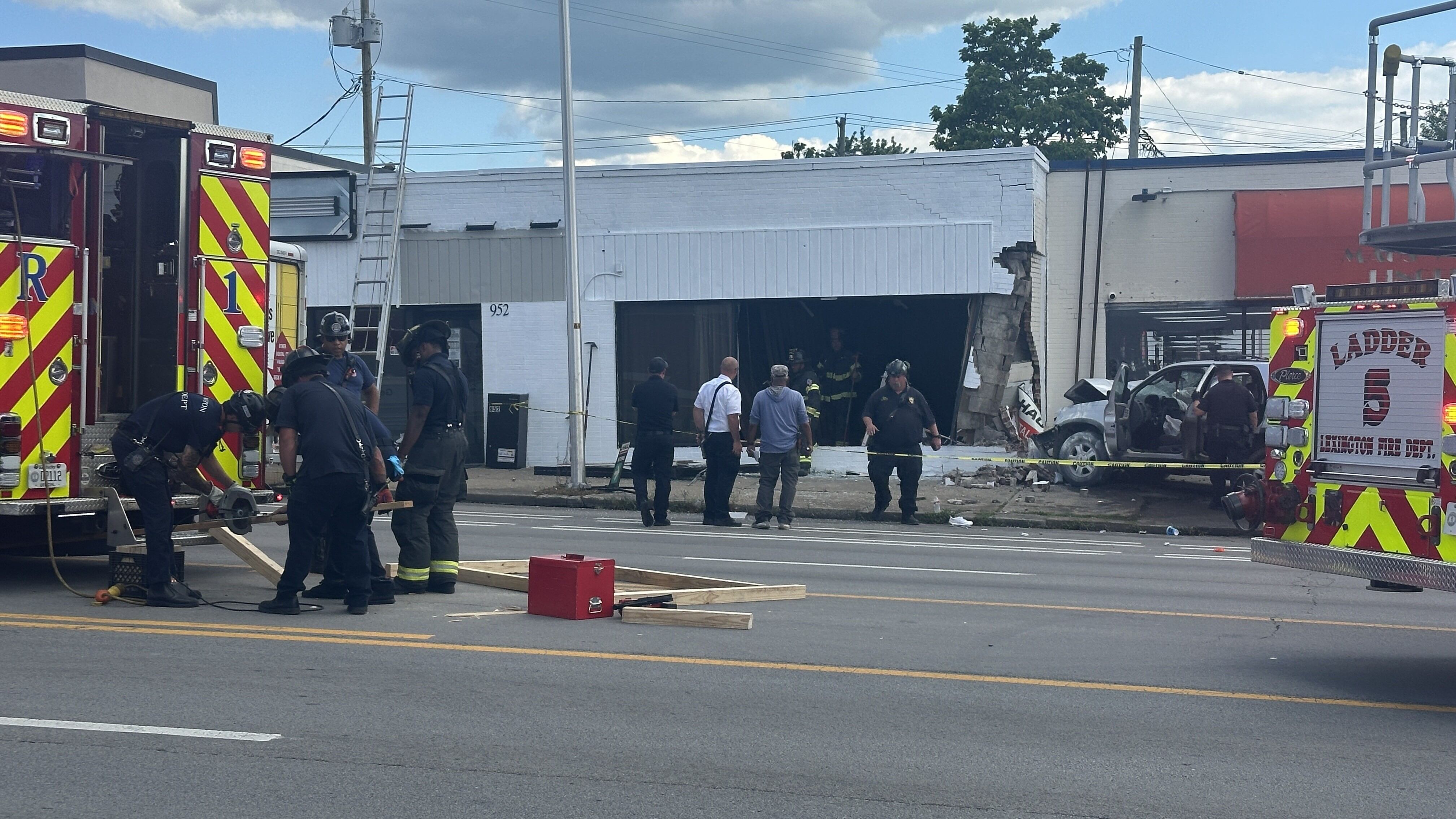 1 person sent to hospital after vehicle hits Winchester Road building