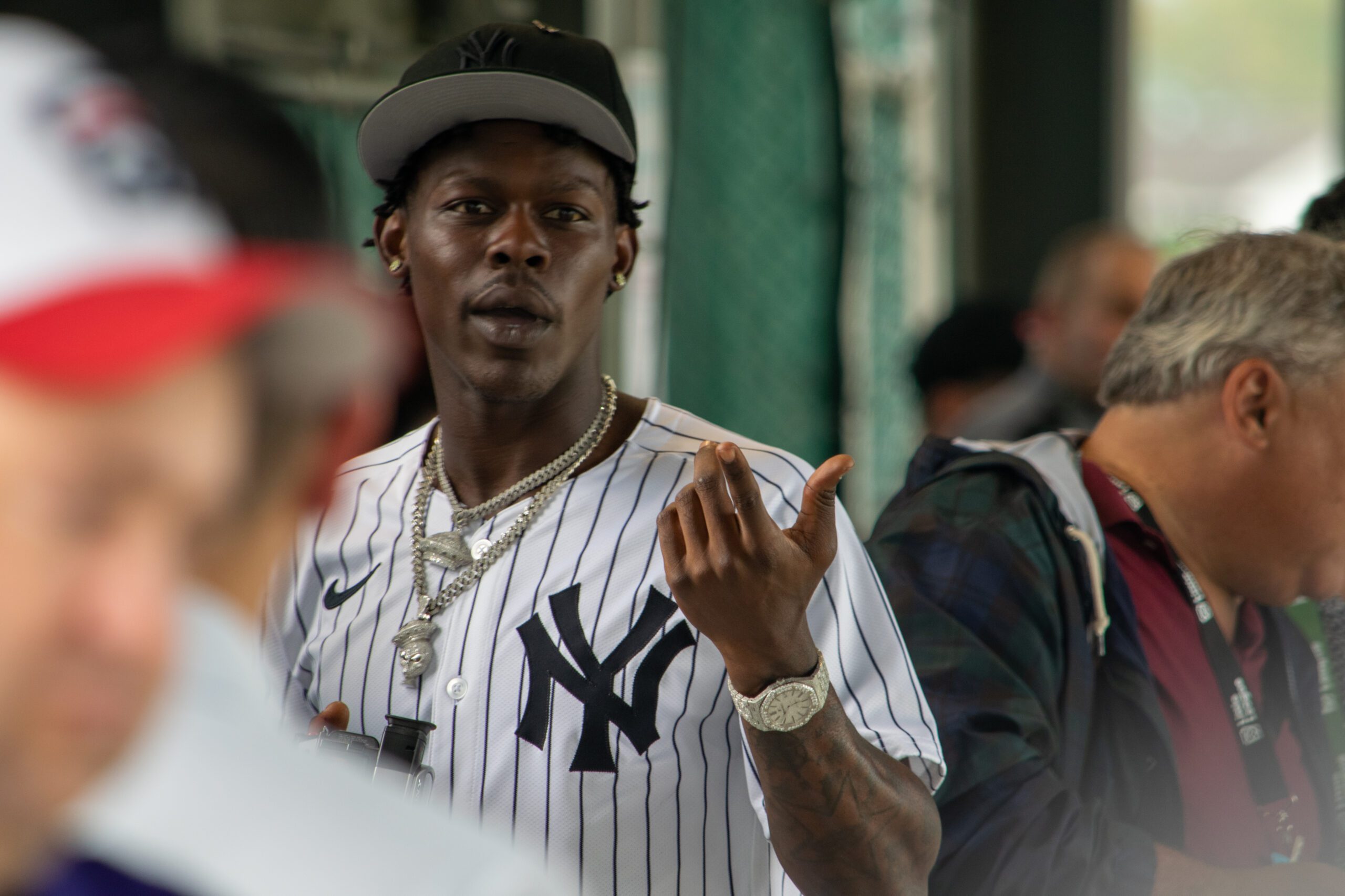 Aaron Boone reacts after Jazz Chisholm Jr. takes the field with a ...