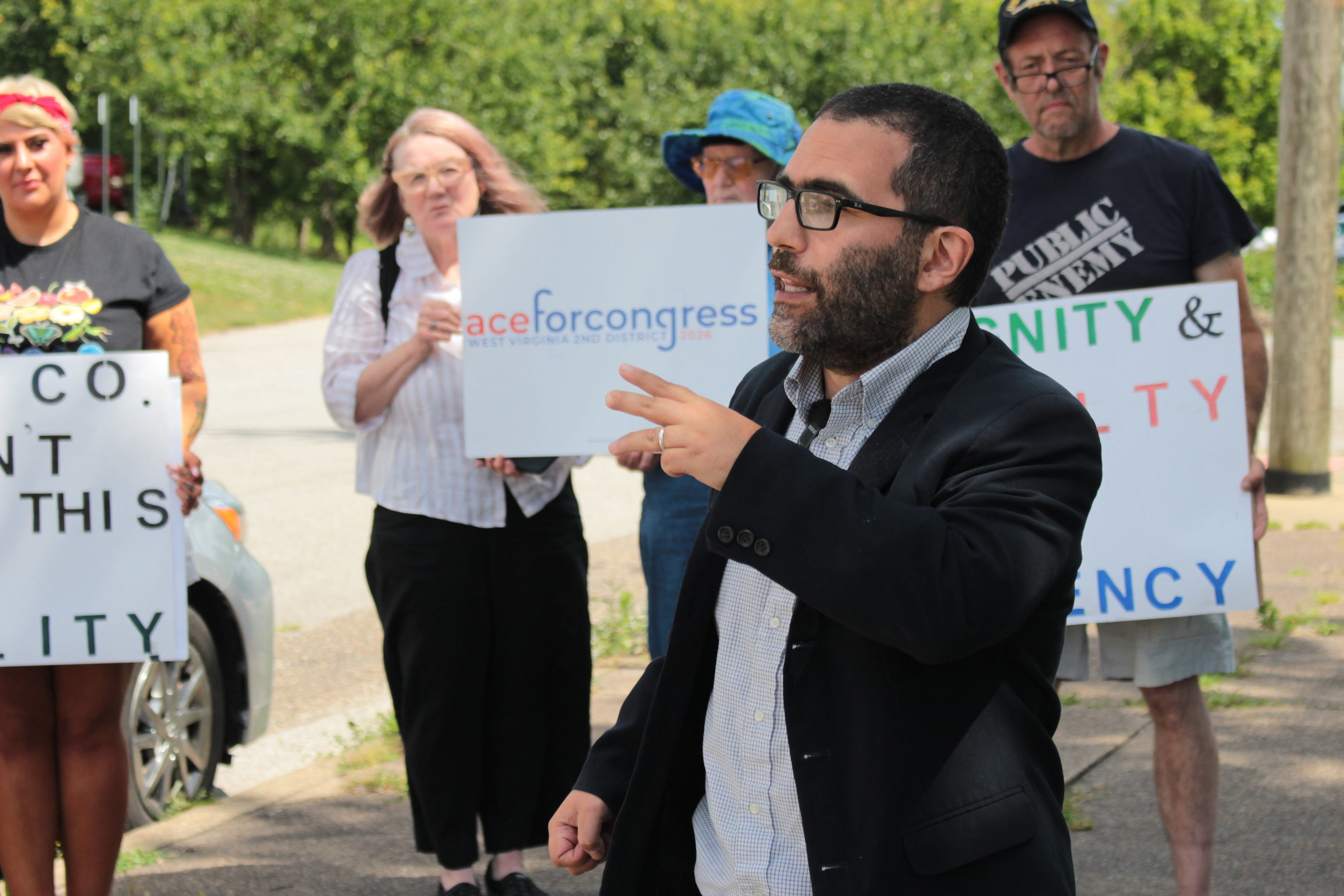 Democratic House nominee Ace Parsi criticizes federal cuts at ...