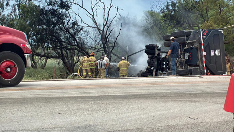 Semi-trailer truck overturns, catches fire after crash east of Anson