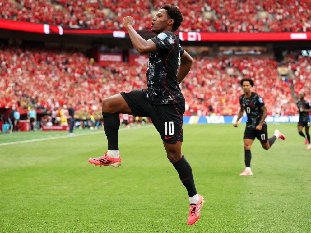 Why a Toronto billboard says three beers for Canadian World Cup star ...