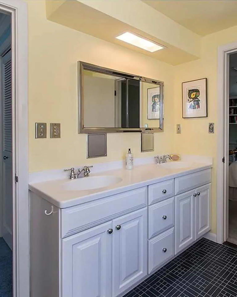 She added vintage wicker baskets to her family bathroom - so much storage!