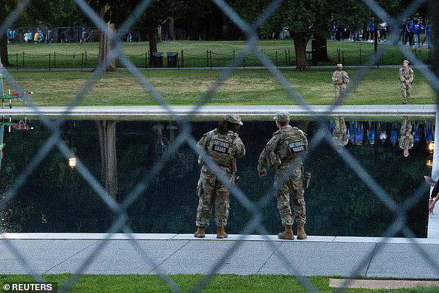 Trump erects fence around Reflecting Pool to deter vandals as foul ...