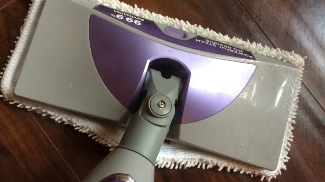 Risks of steam mopping wood and safer cleaning methods