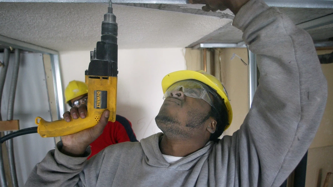How to drill drywall with minimal dust and damage