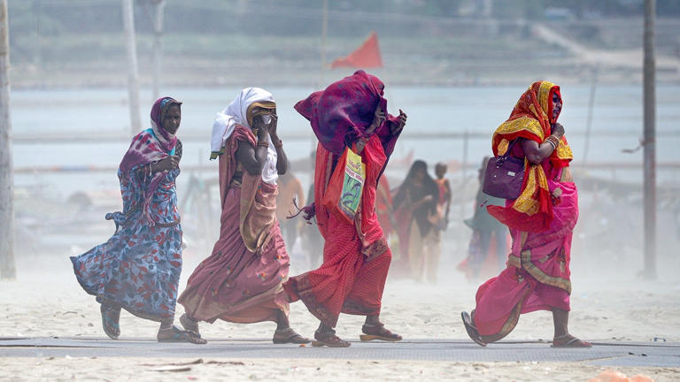 World getting harder to live in: Dangerous humid heat days doubled ...
