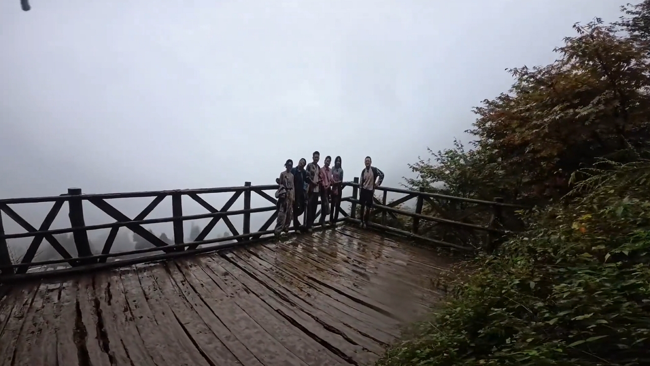 Mysterious life-sized cutouts on a misty deck in Sichuan