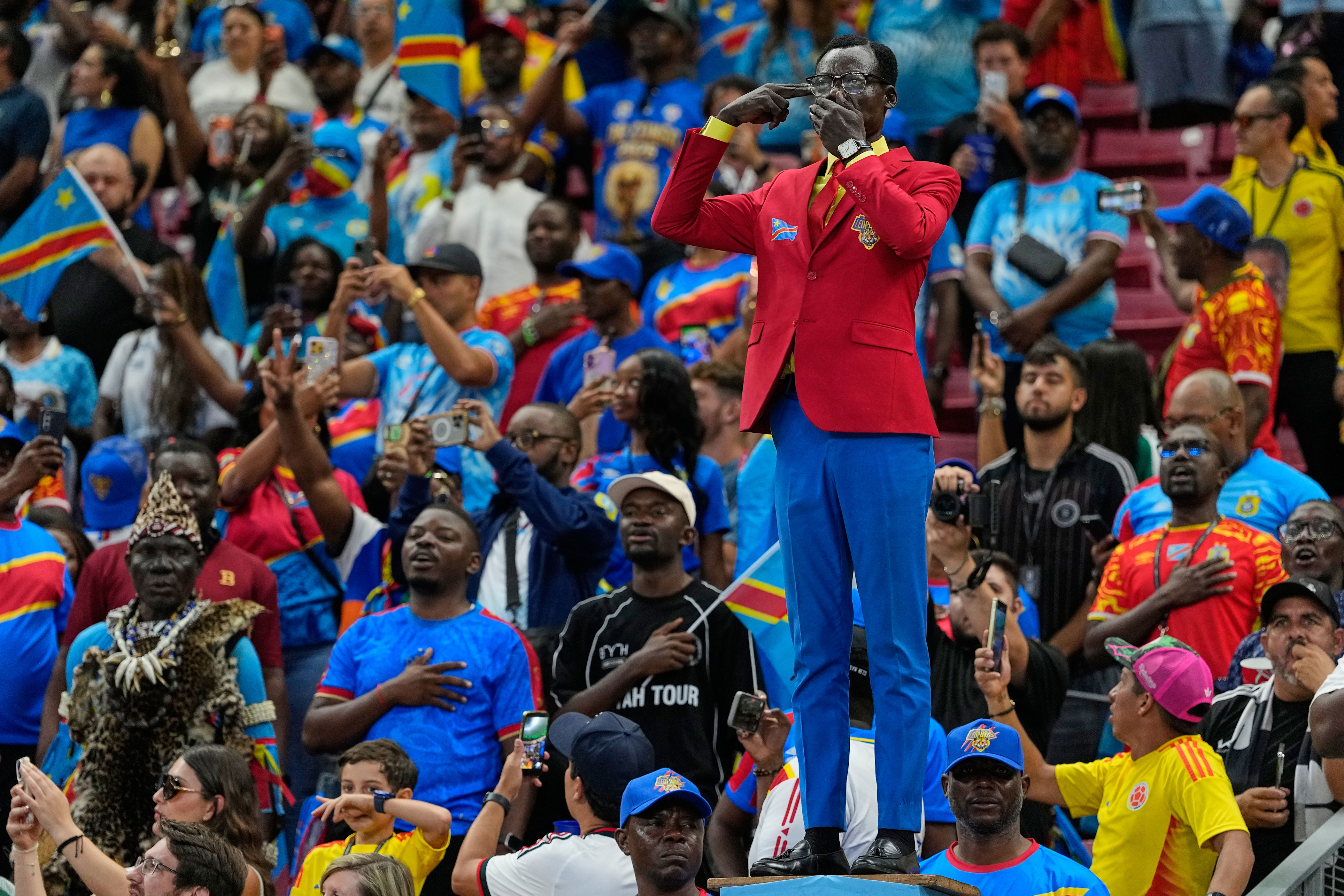 Congo fan who poses as living statue of independence leader Lumumba ...