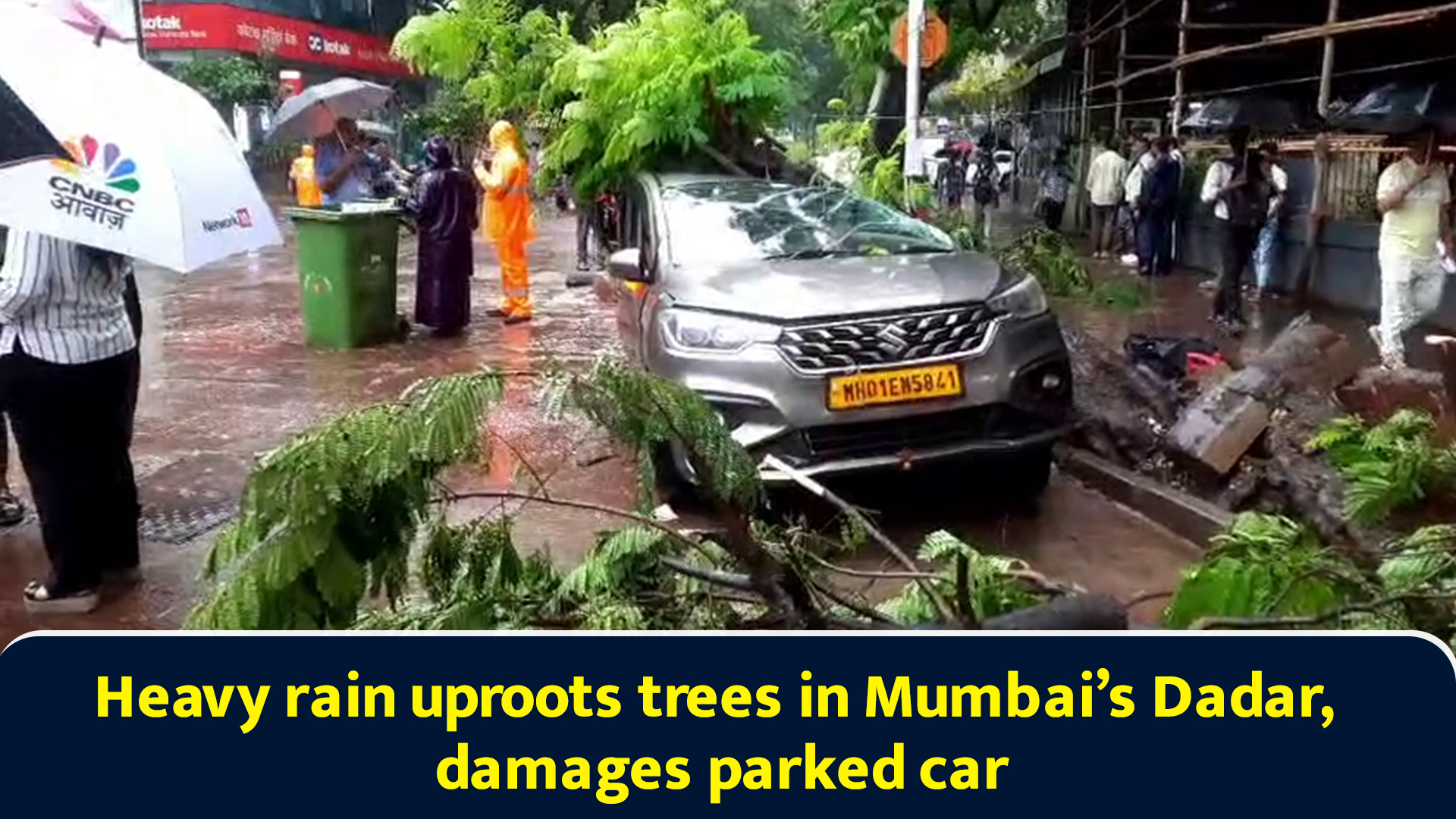Heavy rain uproots trees in Mumbai’s Dadar, damages parked car