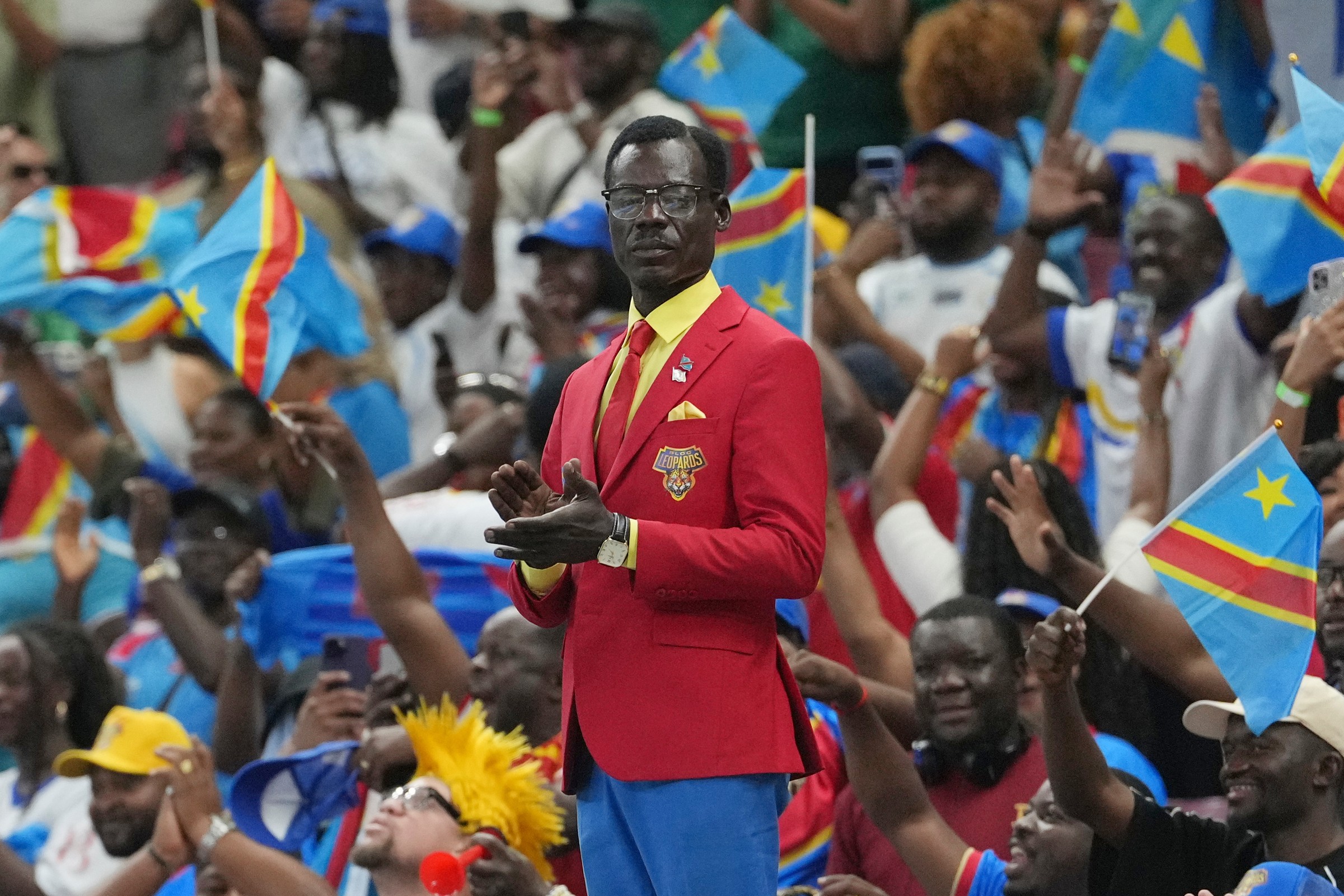 Congo fan who poses as living statue of independence leader Lumumba ...