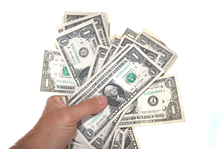Dollar at 13-month high as rate hike bets, stock rout boost demand
