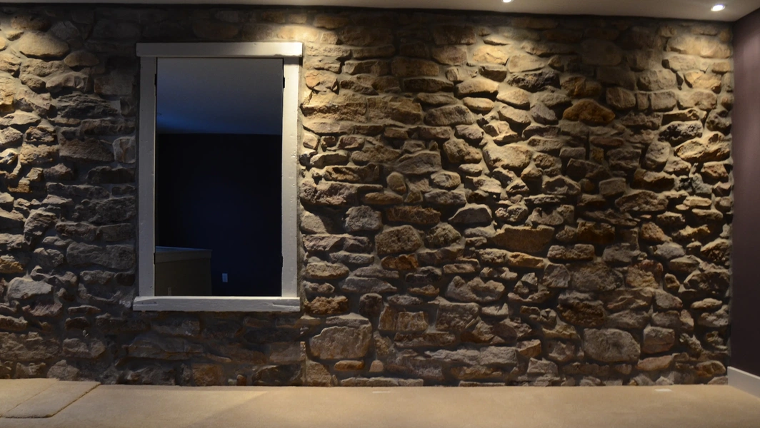 Step-by-step guide to building a stone veneer fireplace