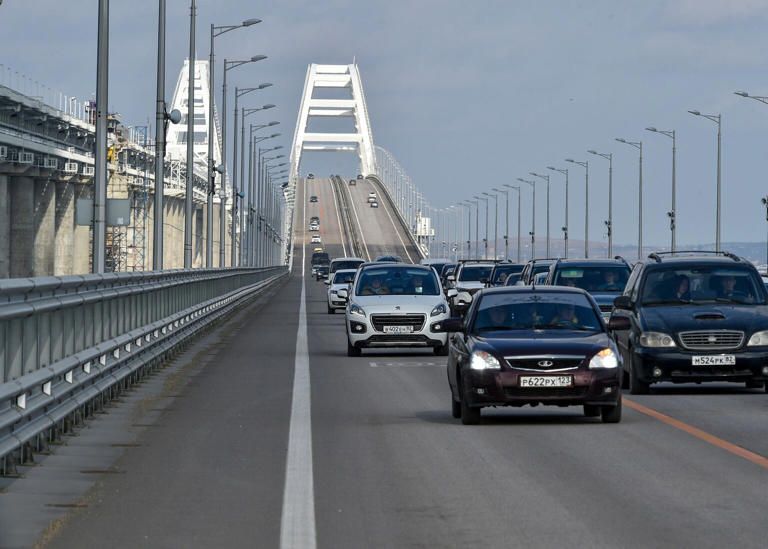 Ukraine says it hit a railway bridge to Crimea as it seeks to isolate ...