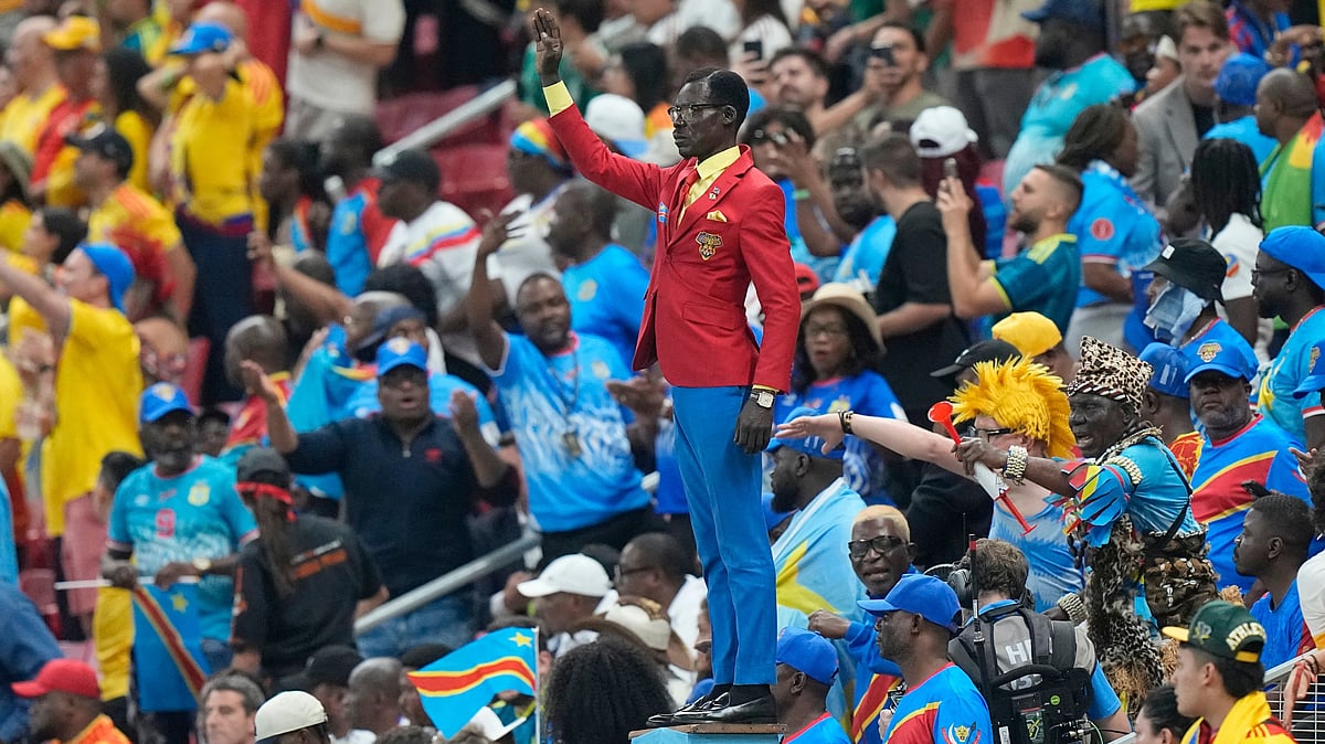 Congo fan who poses as living statue of independence leader Lumumba ...