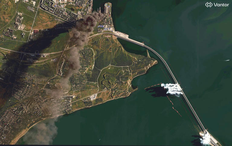 Ukraine says it hit a railway bridge to Crimea, seeking to isolate the ...