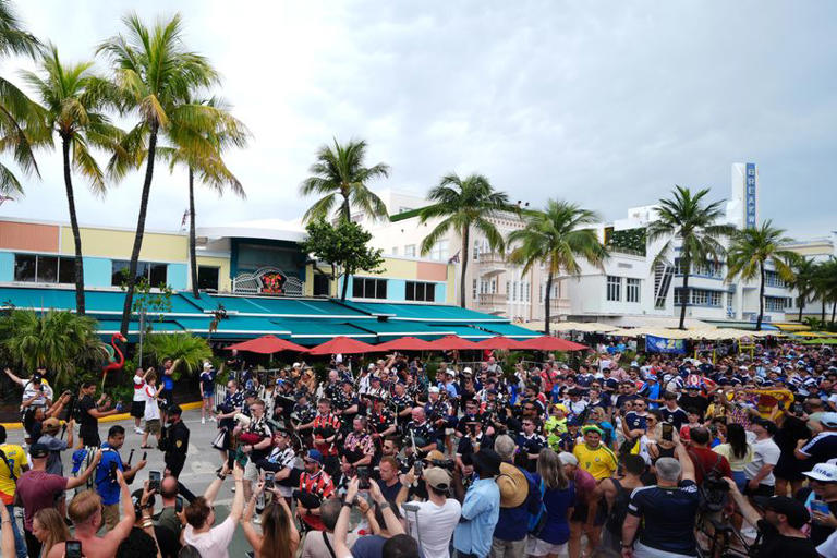Tartan Army march through Miami's Ocean Drive in second day of celebrations
