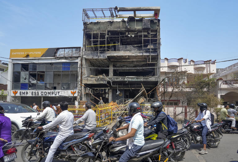 Reminder of loss: Gutted Aliganj building draws mourners, curious onlookers