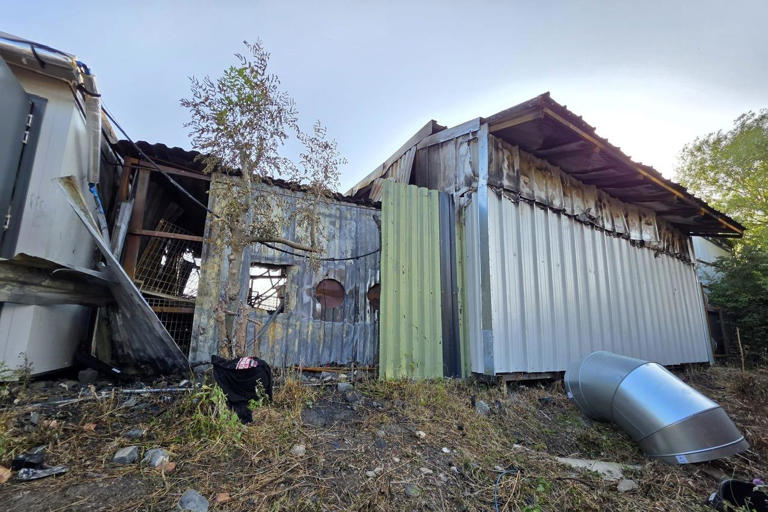Crews to monitor hotspots as cause of large industrial fire in ...