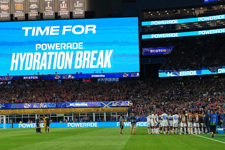 The World Cup’s other hydration break: A high-speed beer run