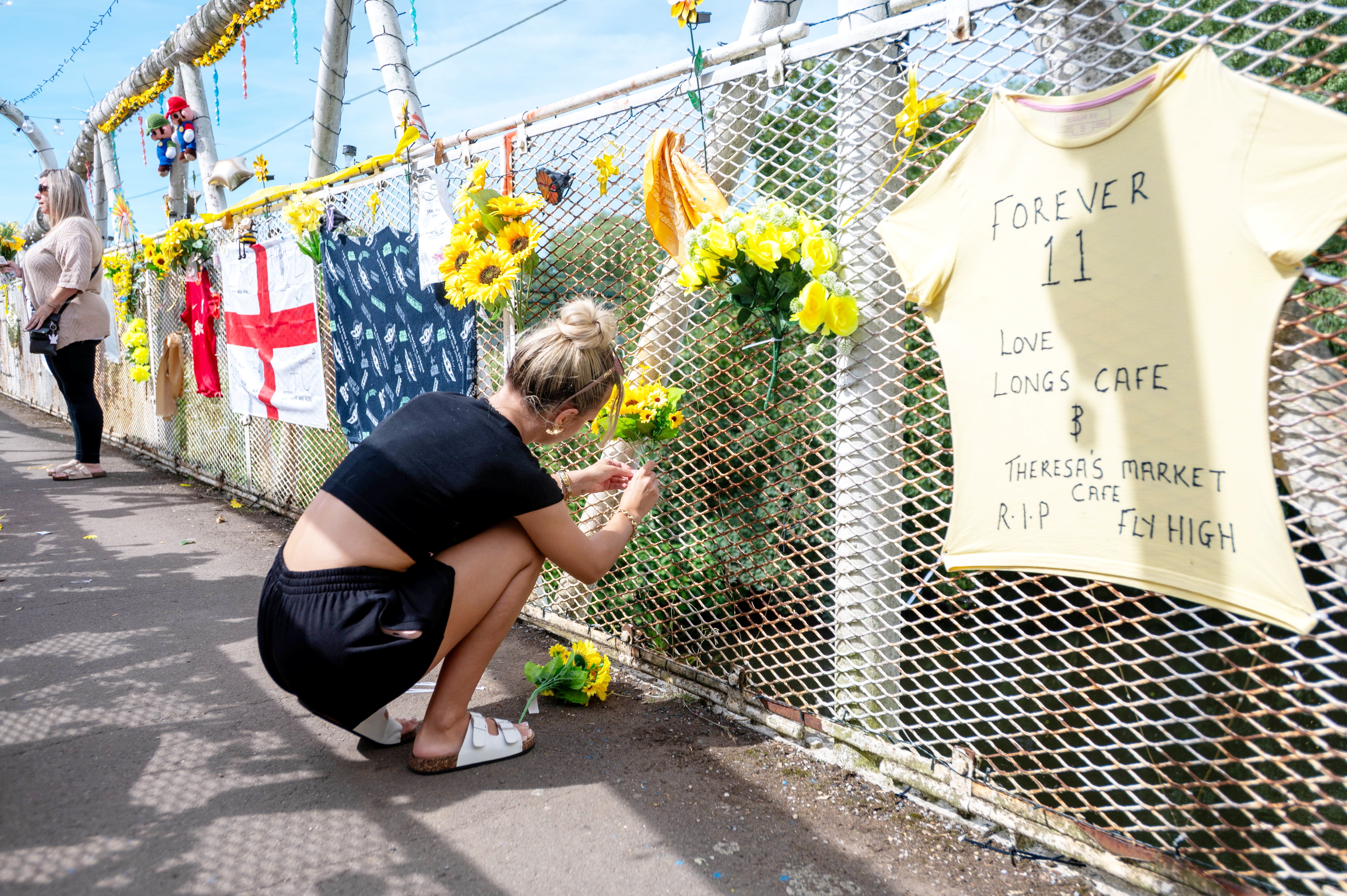 Tributes pile high at 'Kenzie's Bridge' in wake of 11-year-old boy's ...