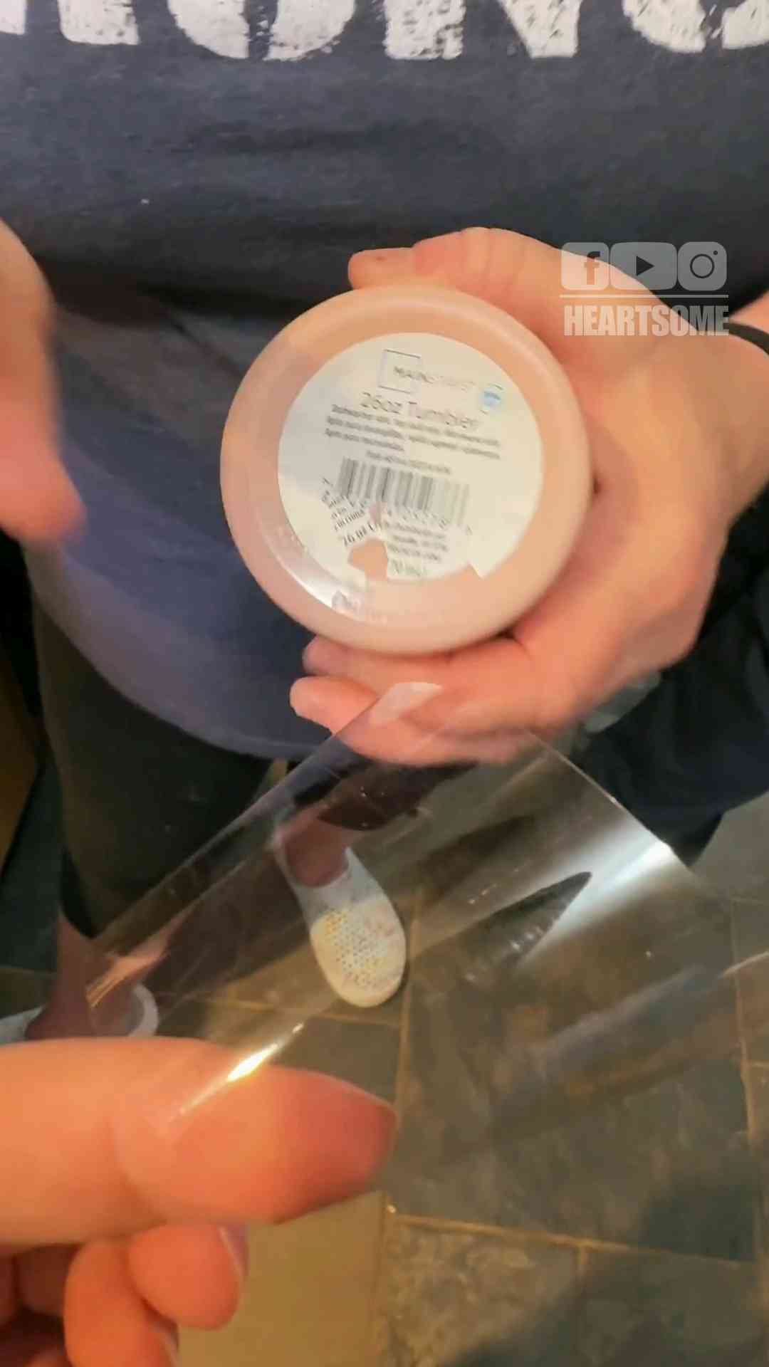 Clever packing tape hack removes plastic cup labels in seconds