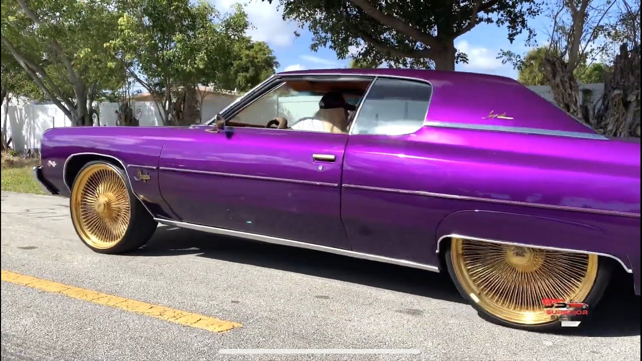 Candy purple 72 Chevy Impala on 24” Daytons | Superior Shelbie