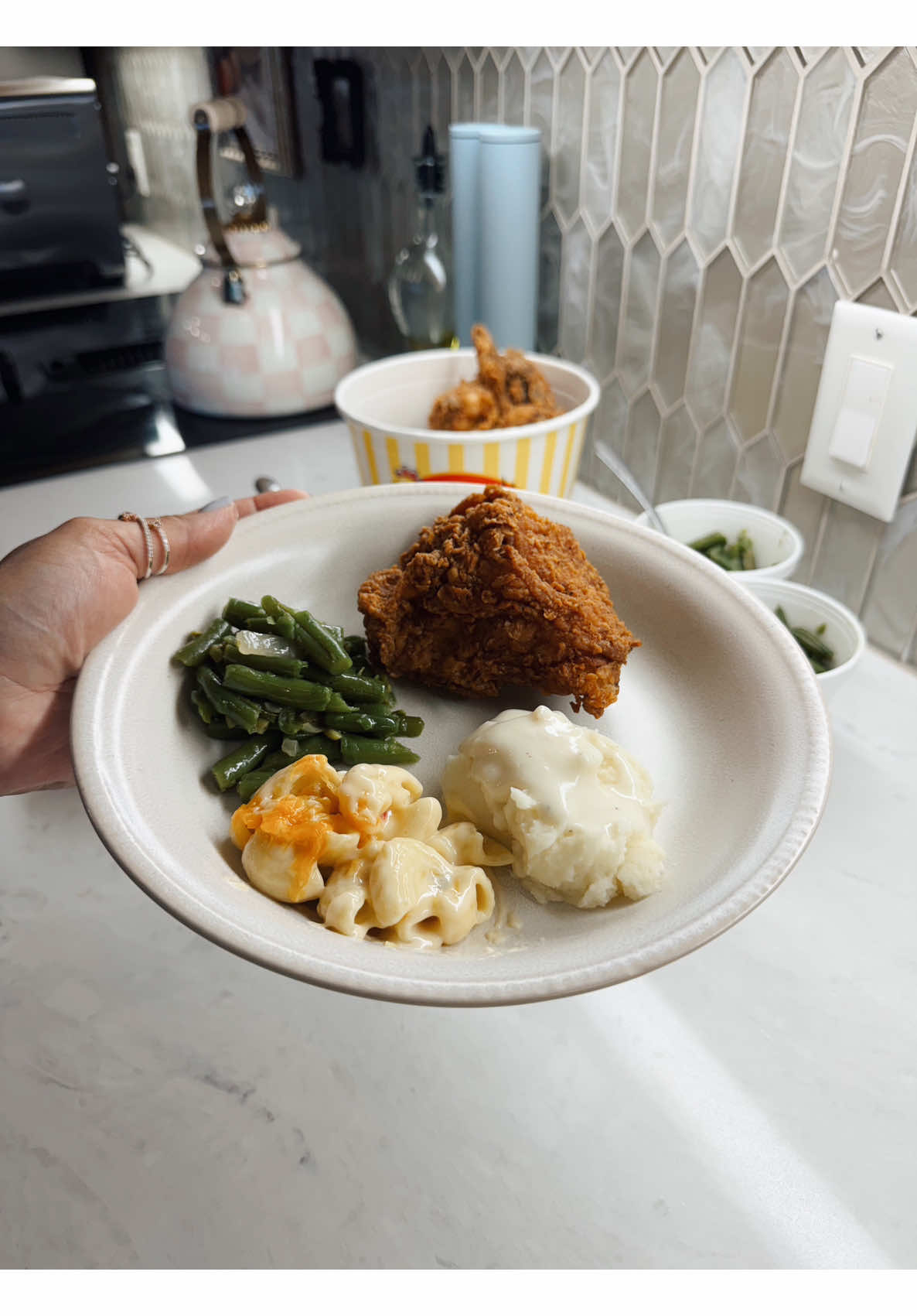 A comforting takeout plate of fried chicken, mac and cheese, mashed ...